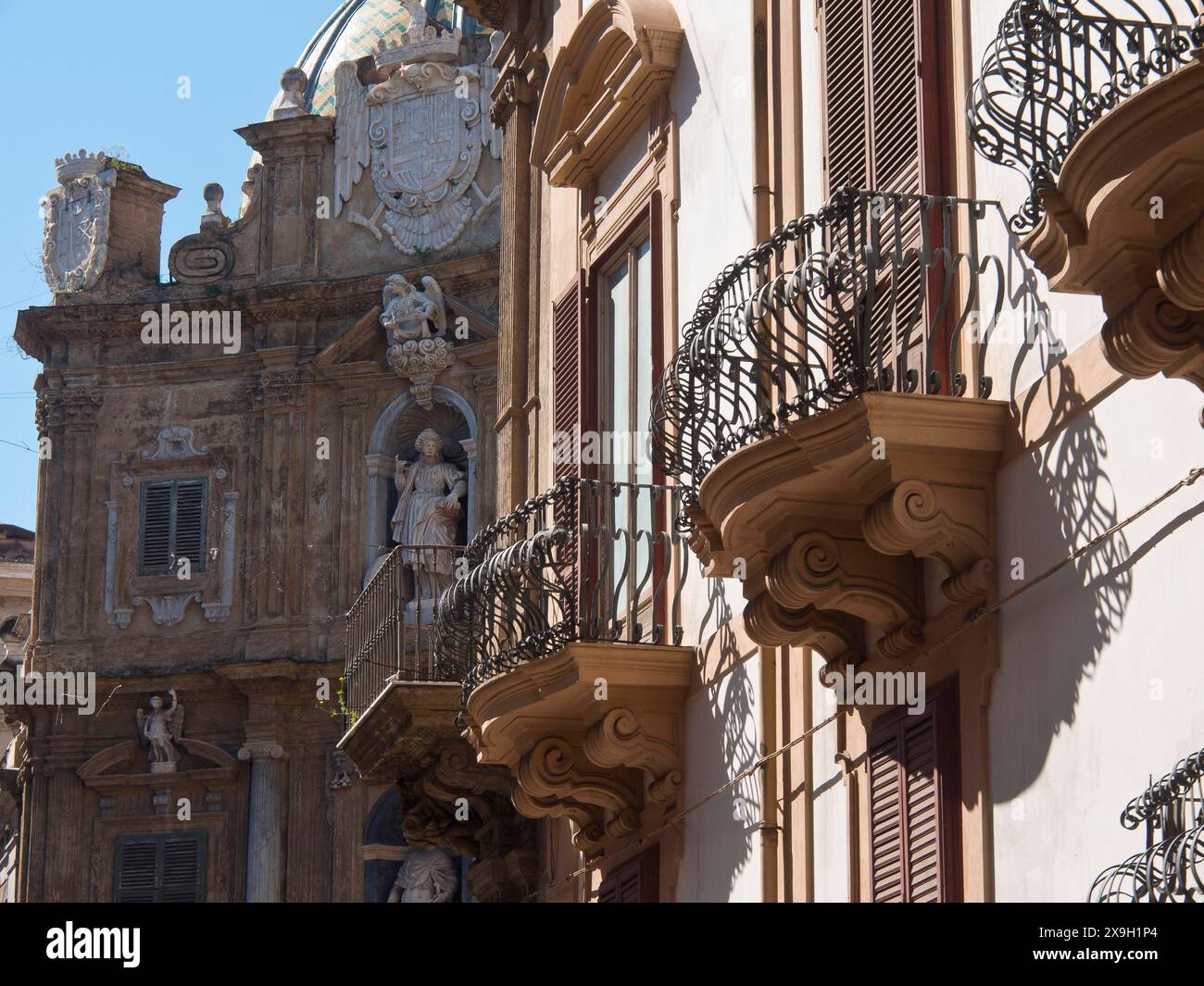 Close-up of balconies and sculptures on a baroque facade, palermo in ...