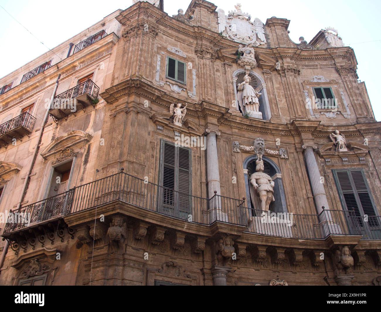 Baroque facade of a historic building with ornate sculptures and ...