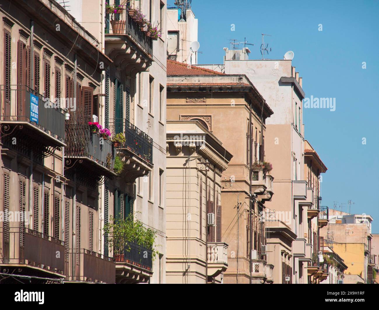 Versatile city view with different building facades and balconies on a ...