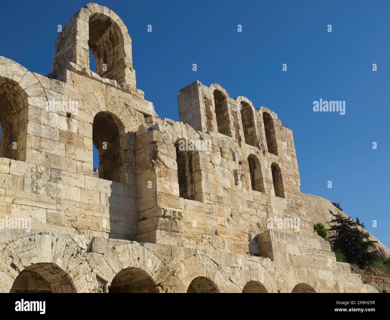 Ancient ruins of historical architecture with stone arches under a clear blue sky, Ancient ...