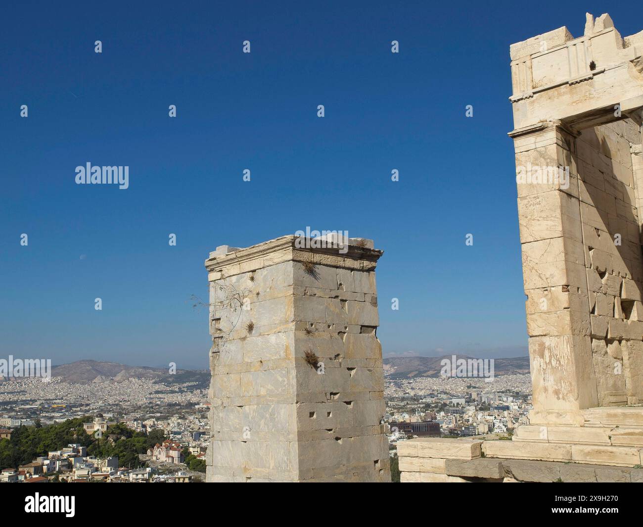 Ancient ruins with columns and urban background, Ancient buildings with ...