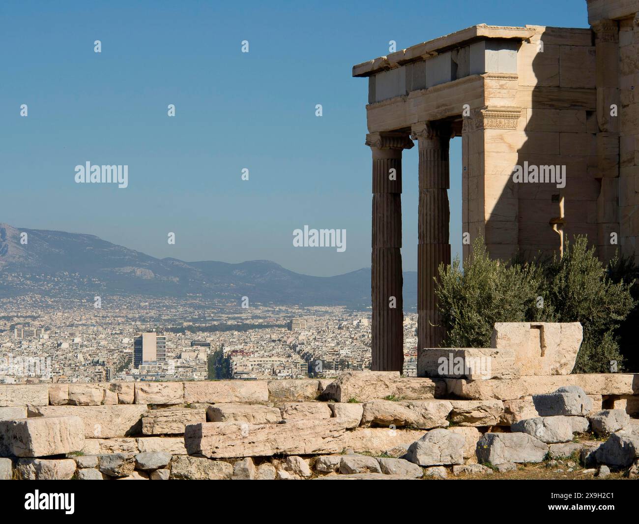 An ancient temple with a view of the modern city and surrounding ...