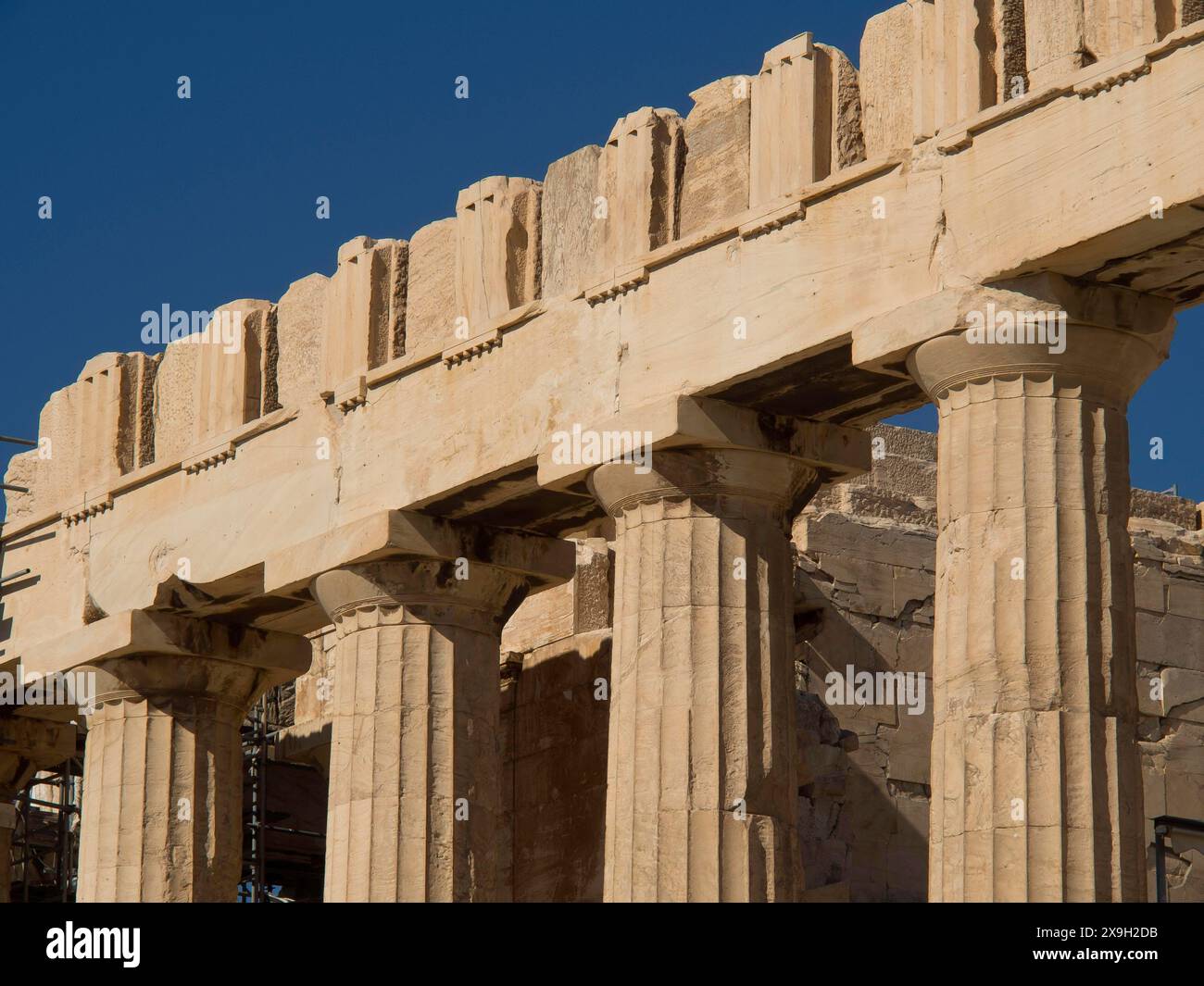 Side view of an ancient temple with columns in bright light and clear ...