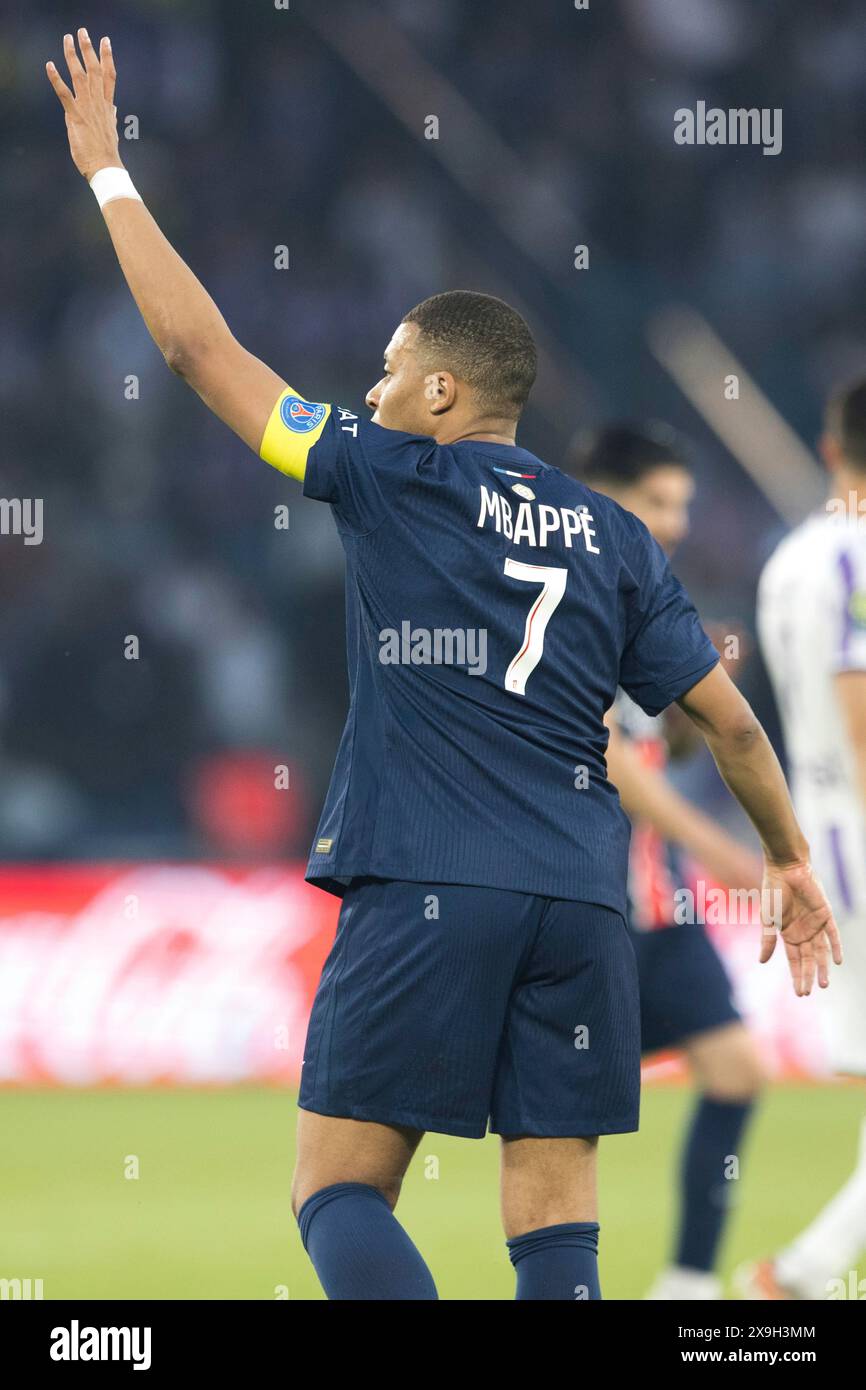 Football match, captain Kylian MBAPPE' Paris St Germain raises his left ...