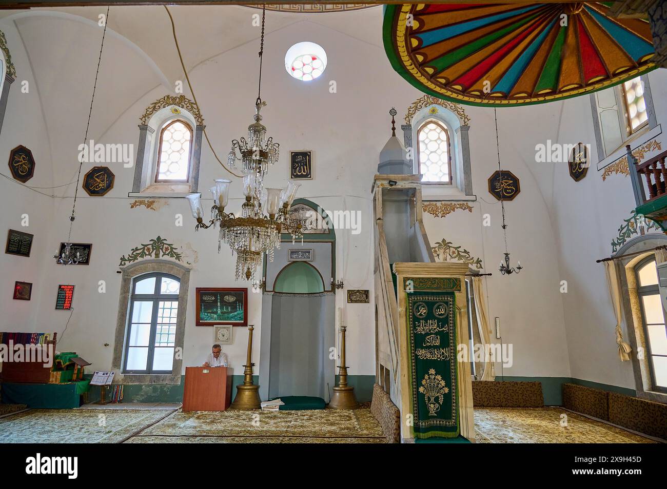 Retzep Pasha Mosque, Prayer room of a mosque with chandelier and ...
