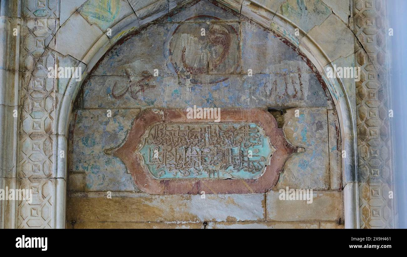 Opposite Retzep Pasha Mosque, Arabic inscription plaque, stone wall ...