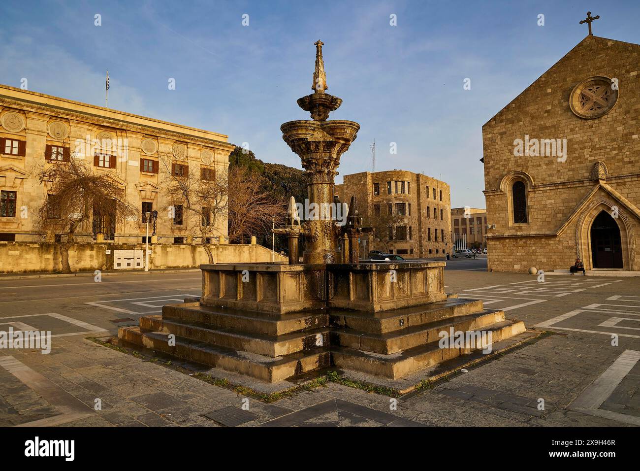 Historic square with a fountain in the centre, surrounded by old ...