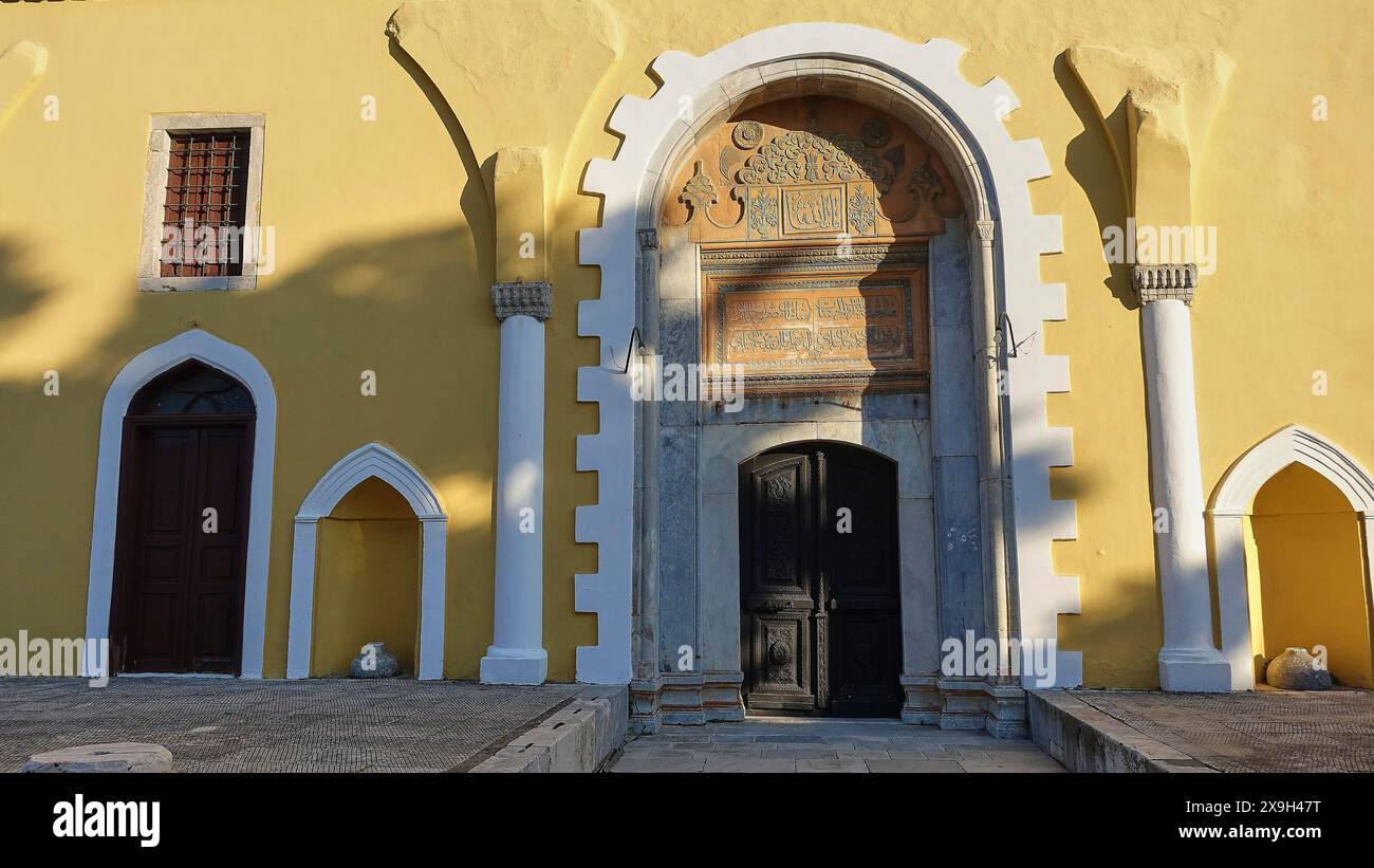 Ottoman Library, Yellow historical facade of a building with an ornate ...