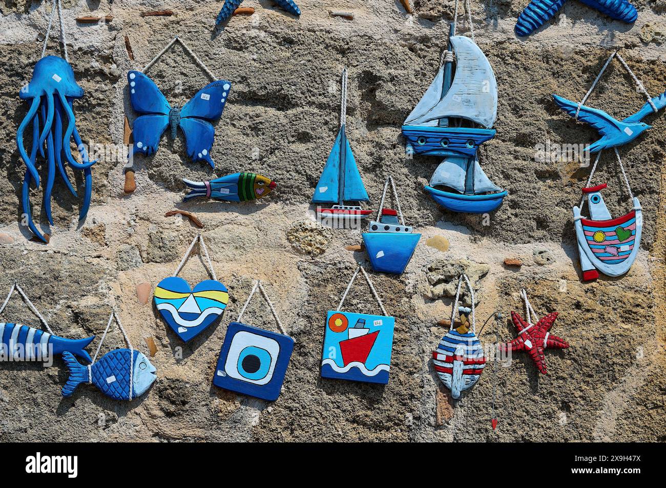 Various blue wall decorations with sea motifs on a stone wall, Old Town ...
