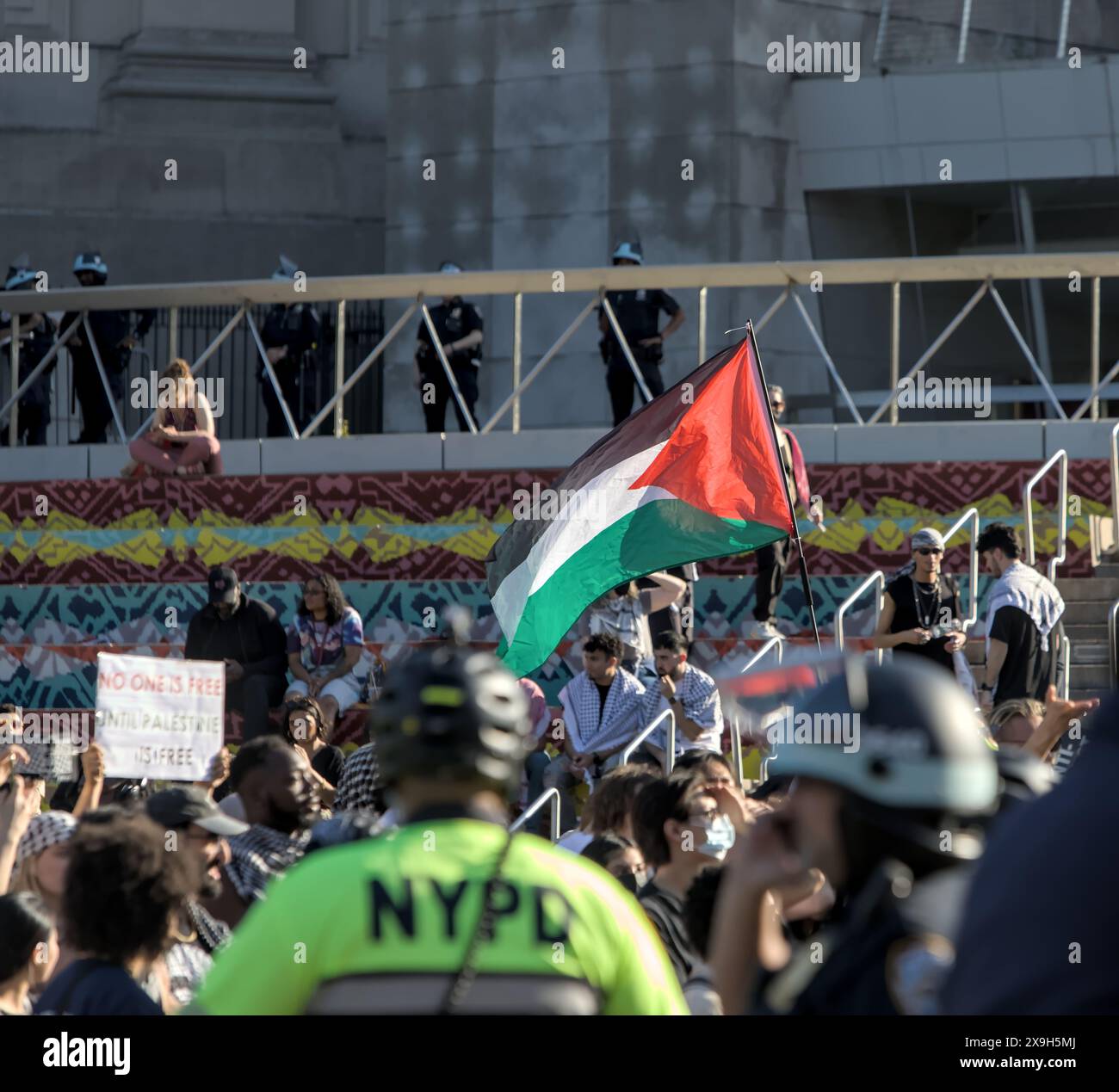 Brooklyn, NY - May 31 2024: NYPD officers with bicycles and helmets ...