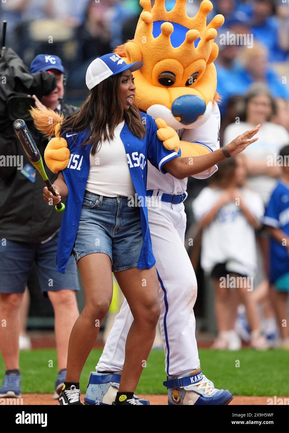 MAY 31, 2024: Royals mascot "Slugger coaches Ego Nwodim at the plate in ...