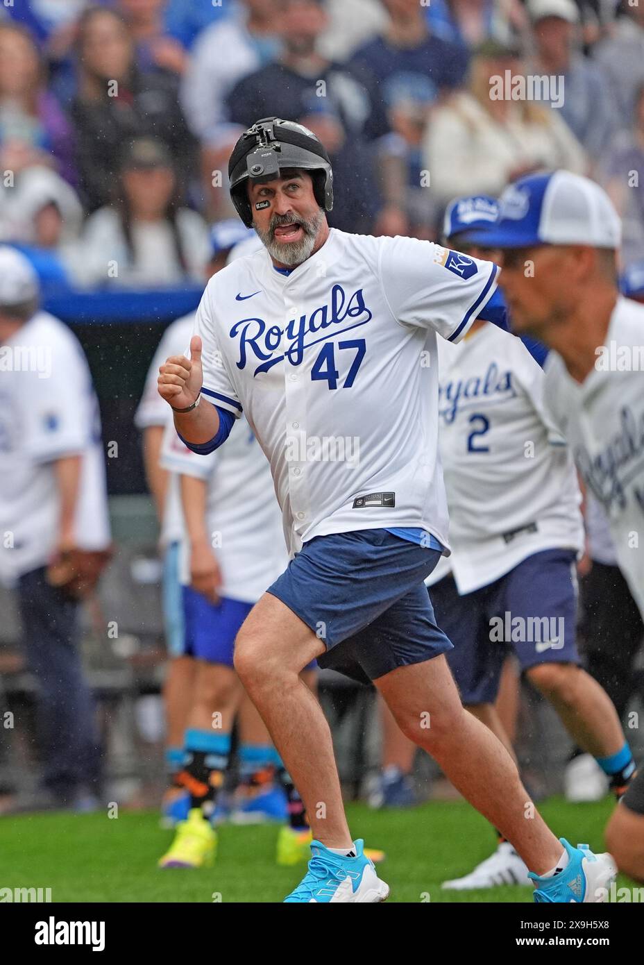 MAY 31, 2024: Rob Riggle races Jeremy Guthrie to home plate in the "Big ...