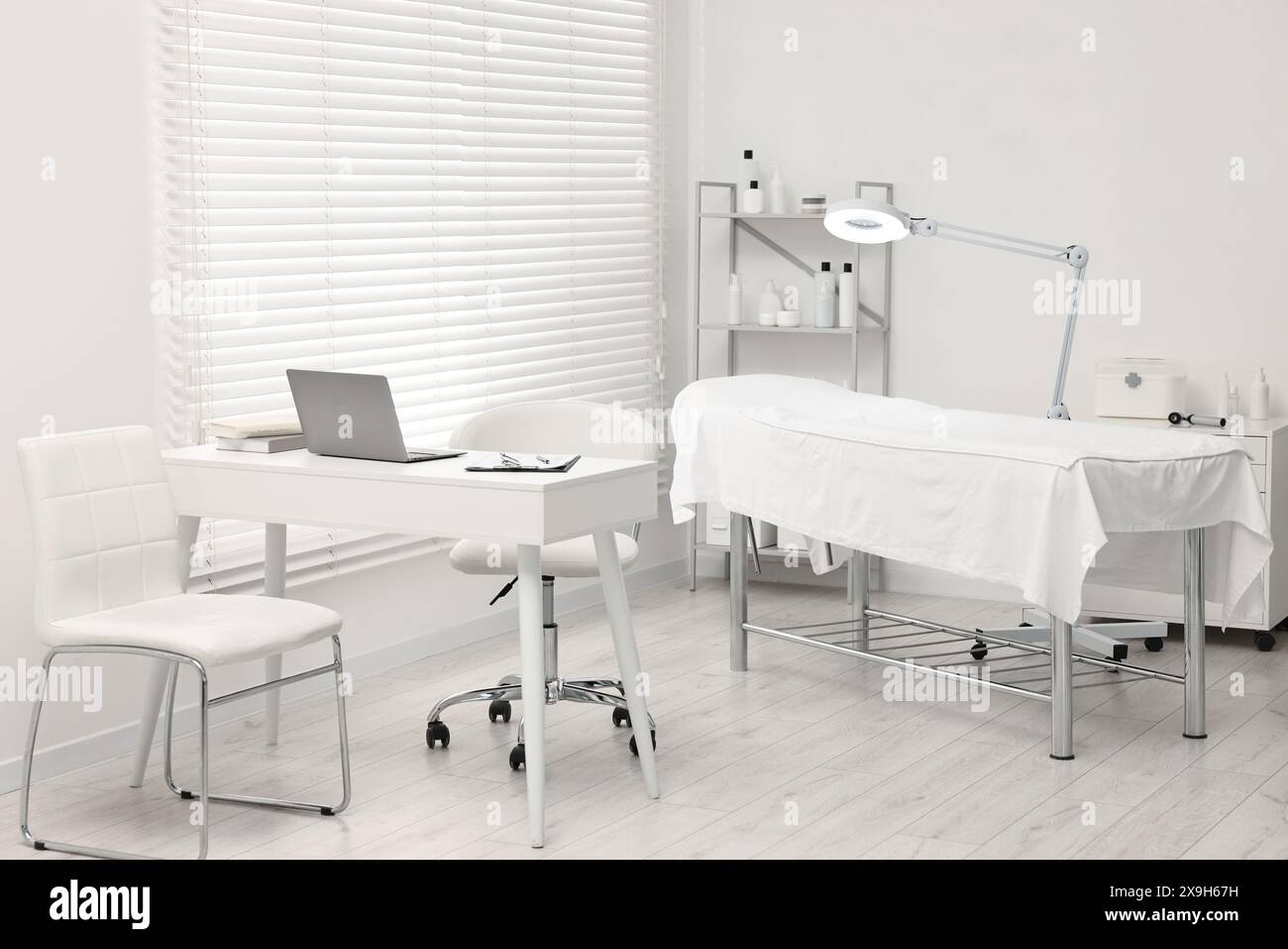 Modern interior of dermatologist's office with examination table Stock ...