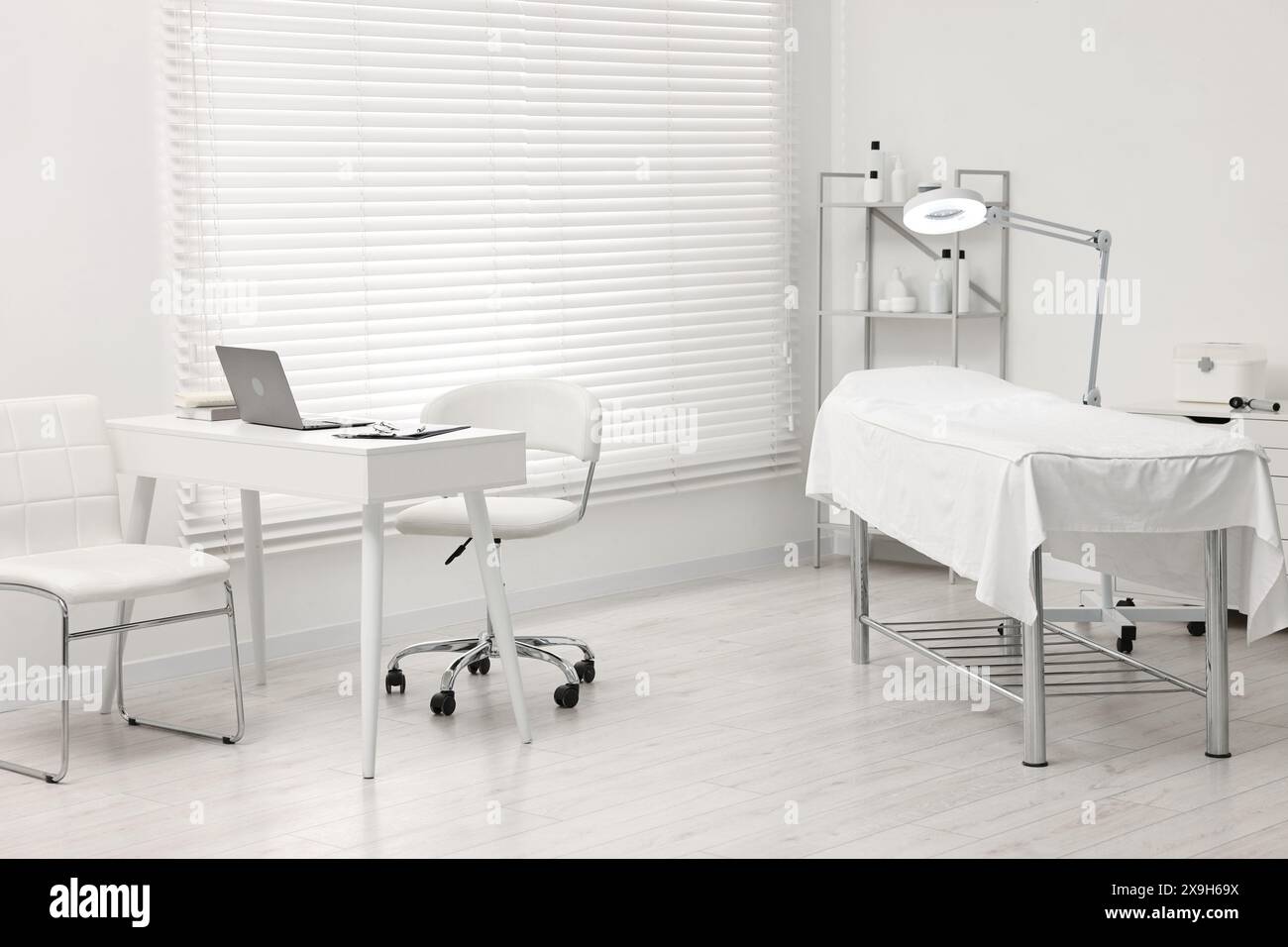 Modern interior of dermatologist's office with examination table Stock ...
