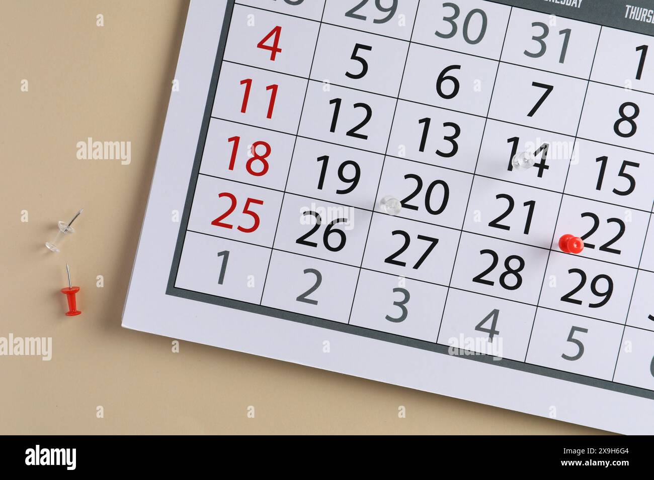 Timetable. Calendar page and drawing pins on beige background, top view ...