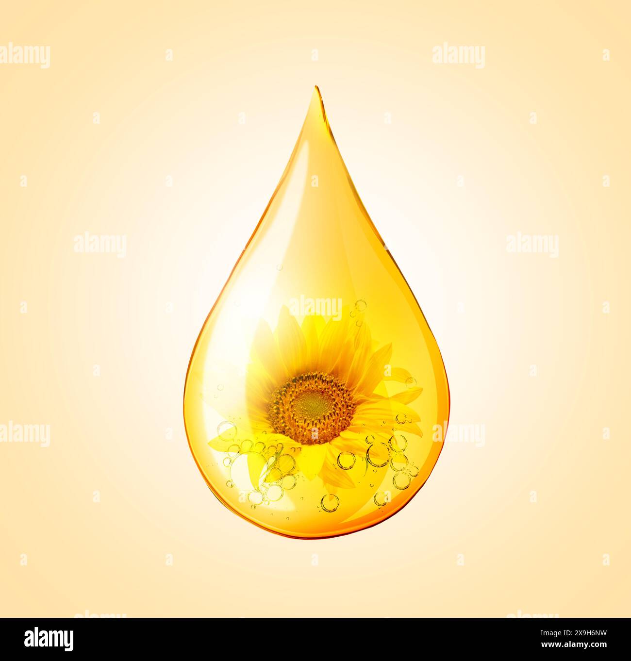 Cooking oil drop with sunflower inside on beige background Stock Photo ...