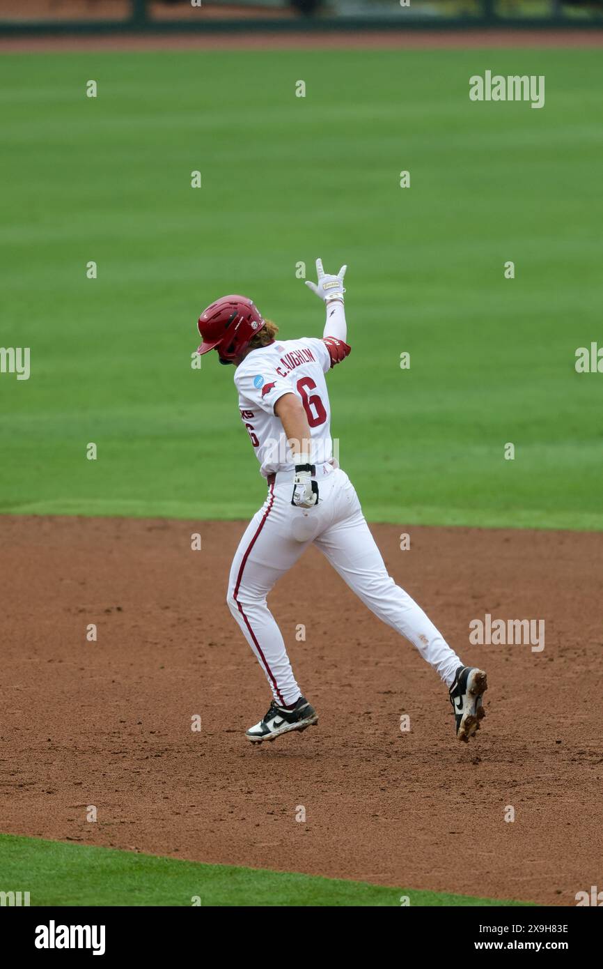 May 31, 2024: Ben McLaughlin #6 of Arkansas signals out to the hog pen ...