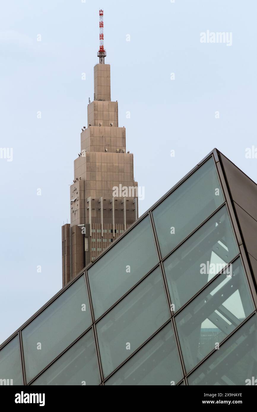 The NTT Docomo Yoyogi Building above a glass pyramid in Shinjuku, Tokyo ...