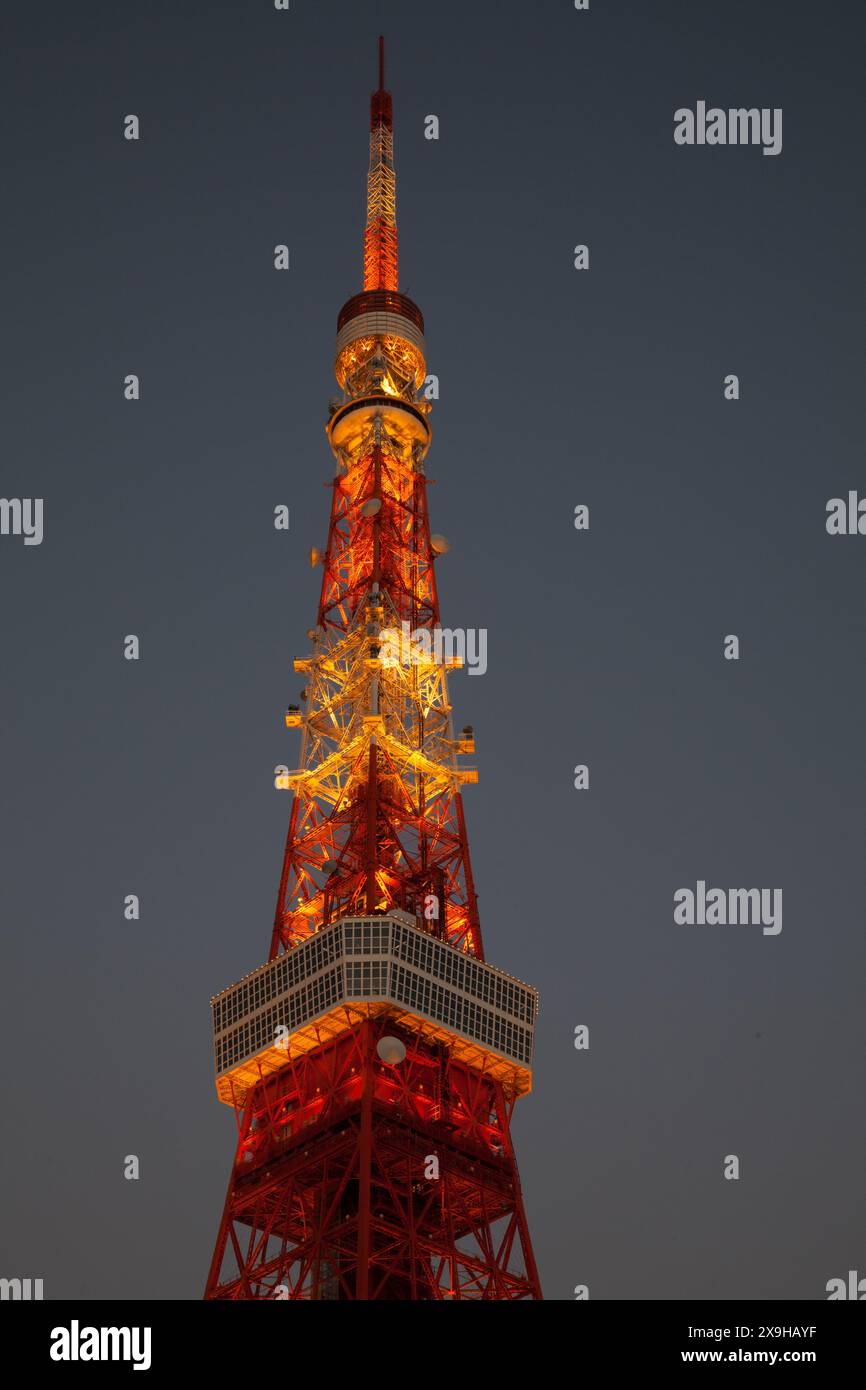 Tokyo Tower illuminated at dusk, Tokyo, Japan Stock Photo - Alamy