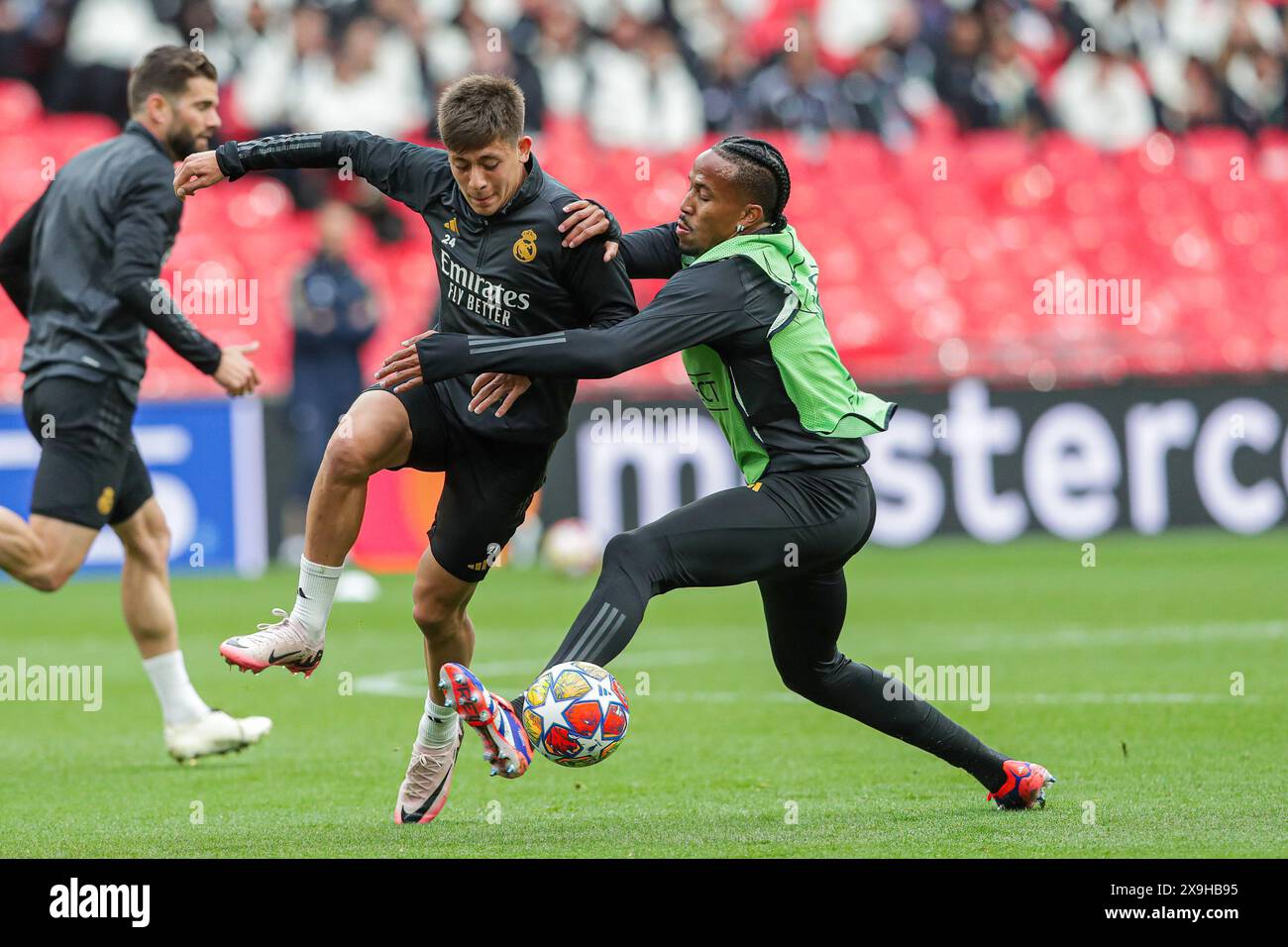 London, UK. 31st May, 2024. Arda Guler of Real Madrid (L) and Eder ...