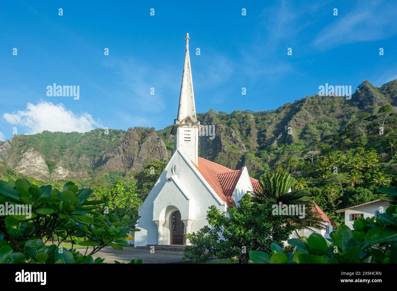 Church in the small scenic village of Omoa, Fatu Iva, Marquesas Islands ...