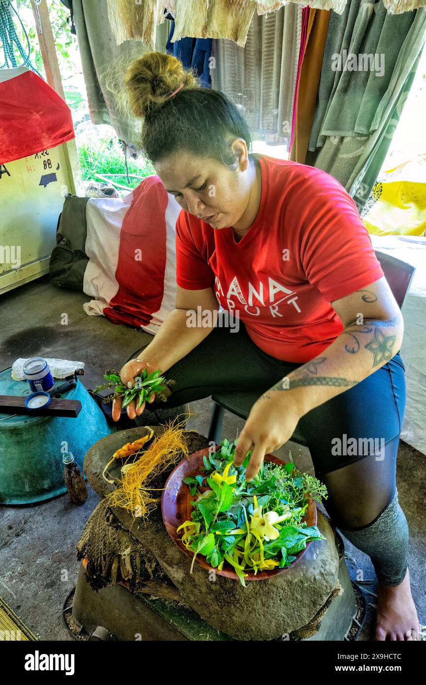 Polynesian lady making a traditional Umu Hei headdress, Fatu Iva ...