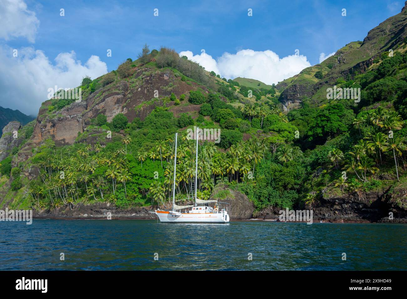 Sailing boat anchored at the renowned bay of Hanavave in Fatu Iva ...