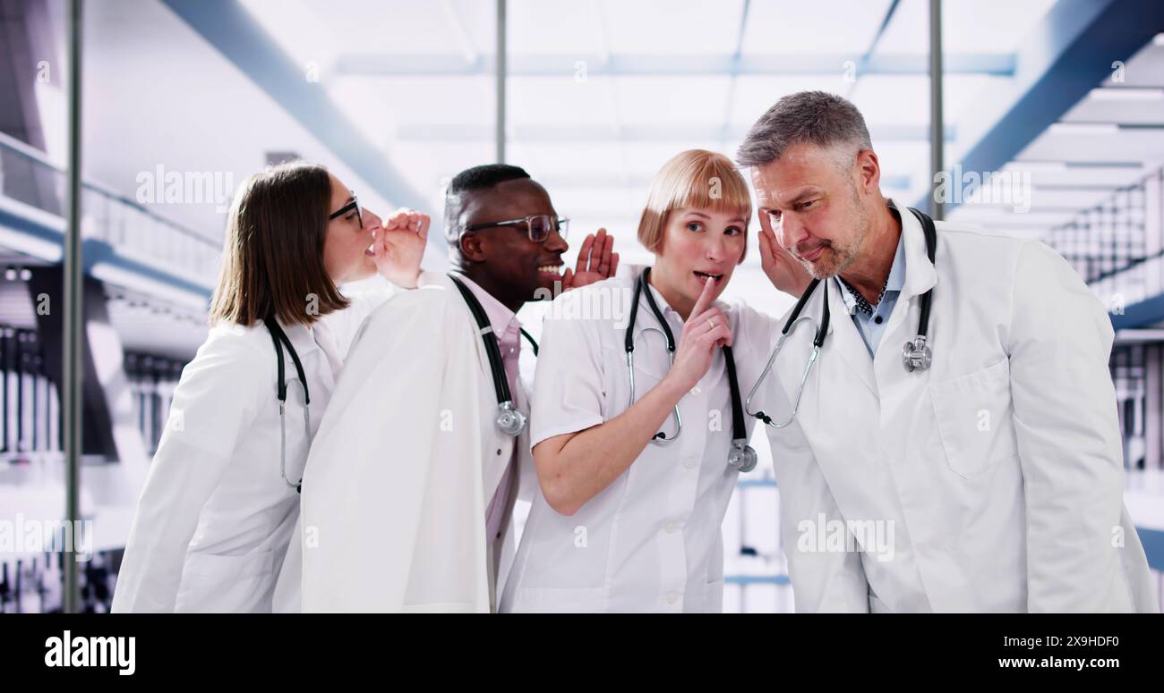 Diverse Group Of Doctors Whispering Gossip Secret Stock Photo - Alamy