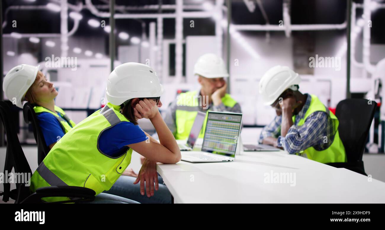 Diverse Engineers Bored At Meeting Training Presentation At Factory ...