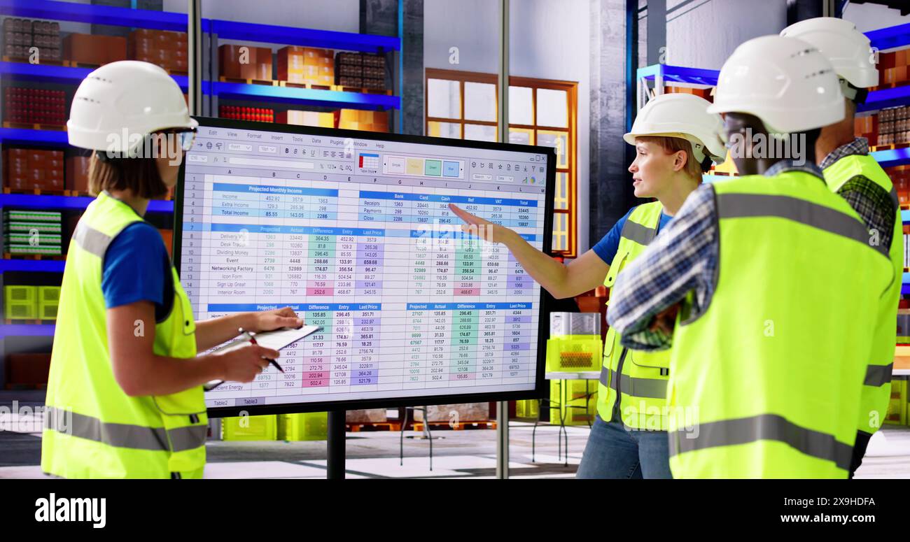 Warehouse Inventory Management On Touchscreen Monitor. Staff In Office ...