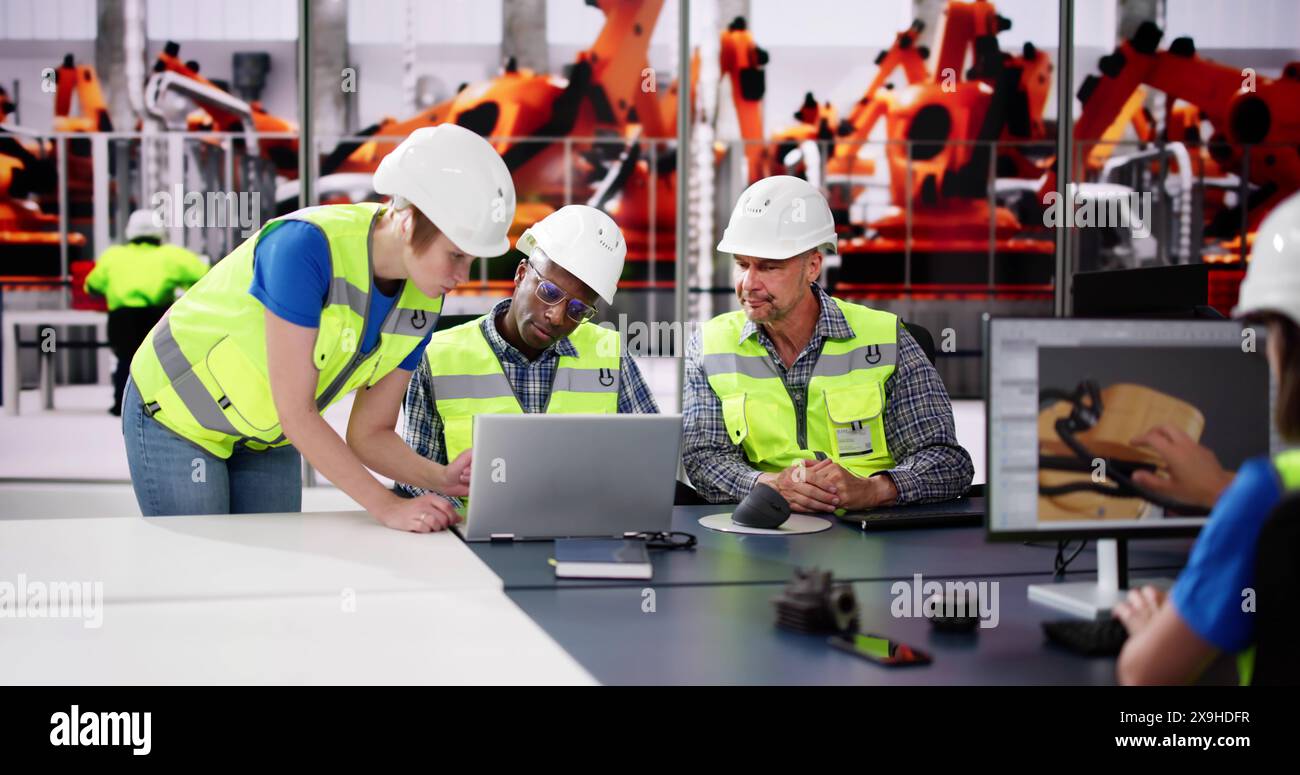 Engineer Using Computer In Electric Car Assembly Factory Stock Photo ...