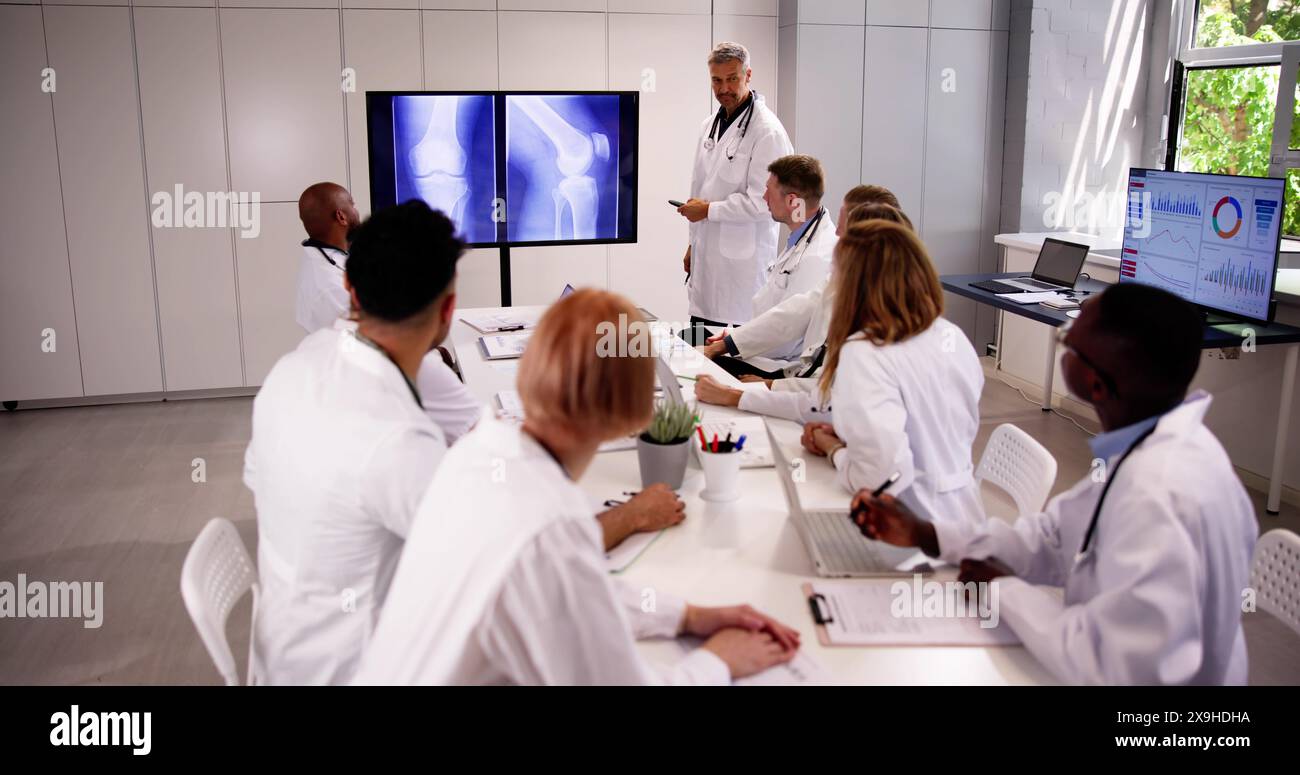 Diverse Doctors Team Looking At MRT Scans Stock Photo - Alamy