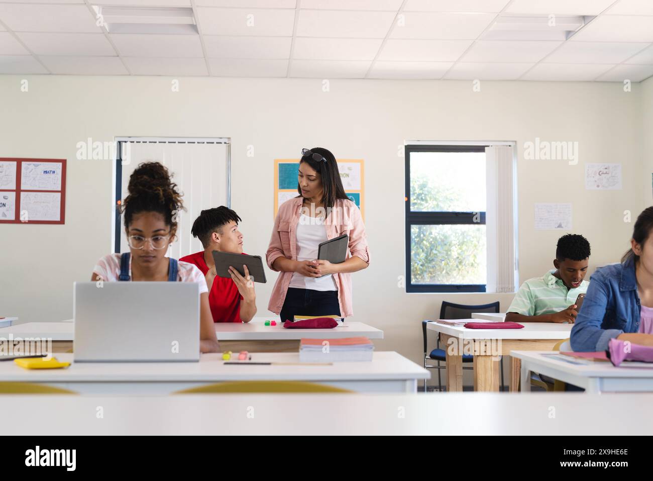 Modern multiracial female school teacher hi-res stock photography and images - Alamy