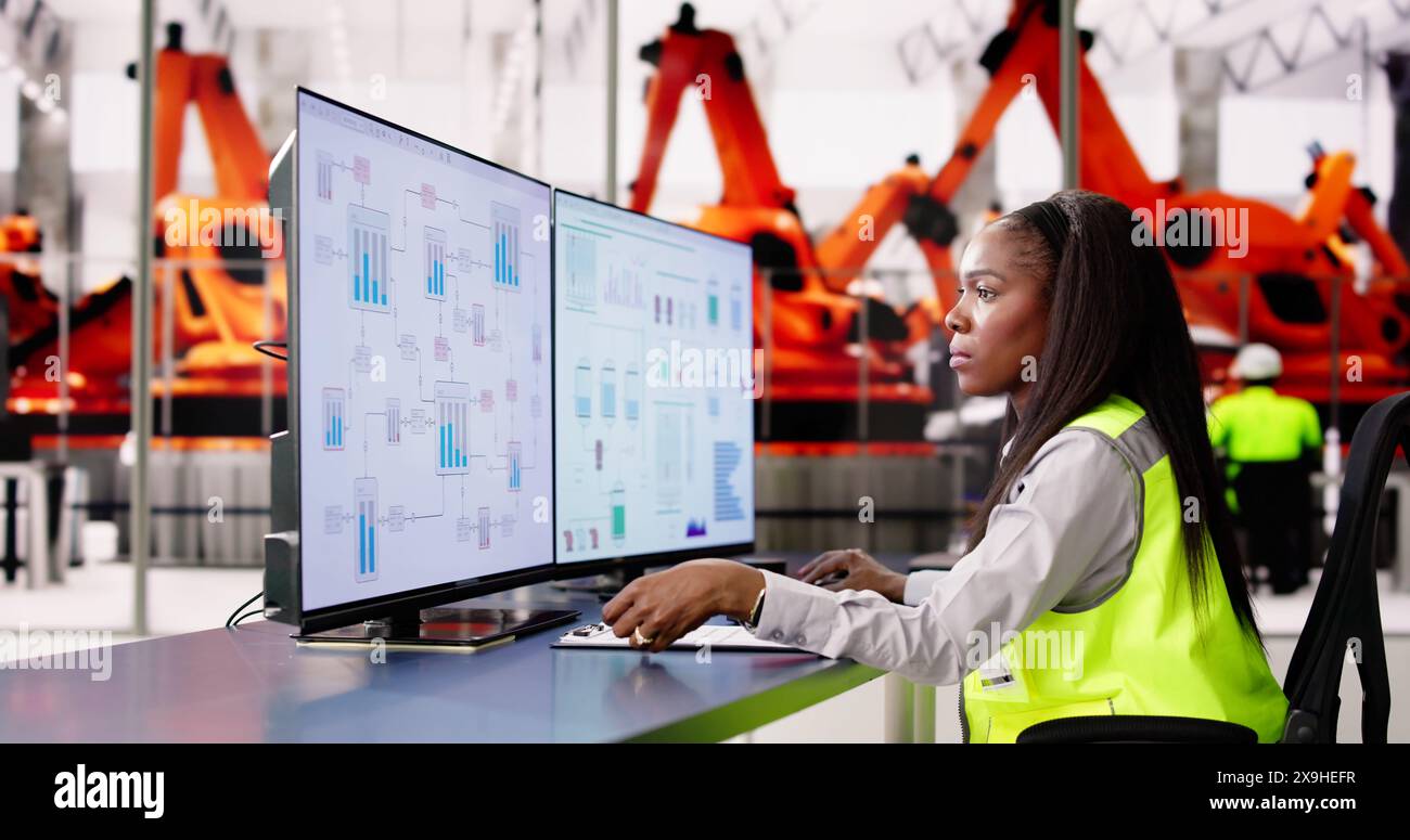 Woman In Automotive Car Factory Using Scada System Stock Photo - Alamy