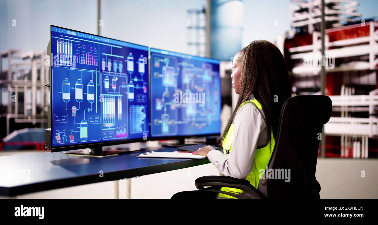 Industrial IOT Automation System. Engineer Using Desktop Computer Stock Photo - Alamy