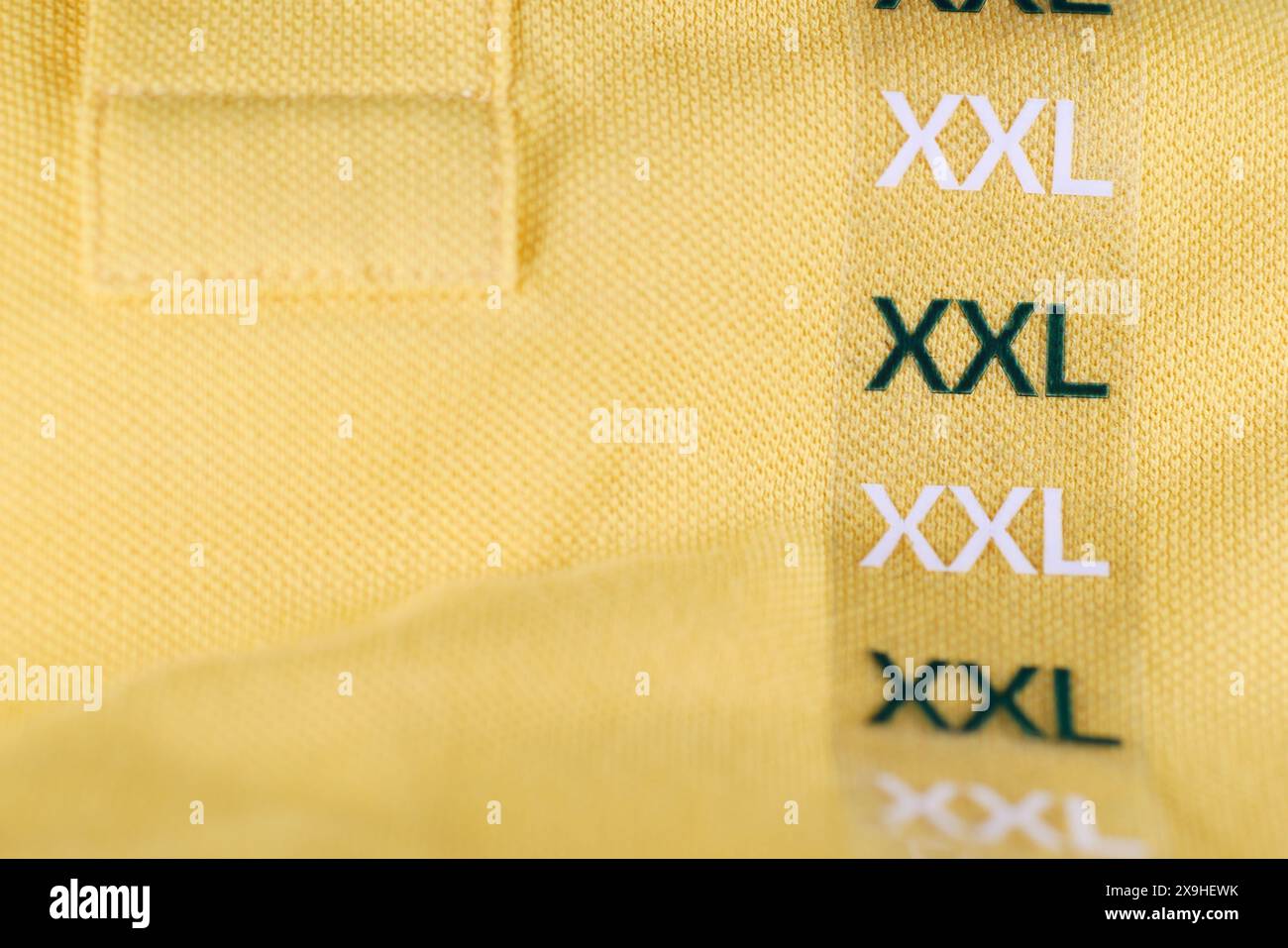 XXL size clothing label tag Stock Photo - Alamy
