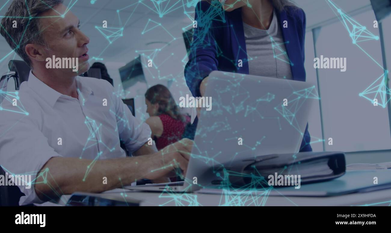 Image of network of connections over diverse business people working at ...