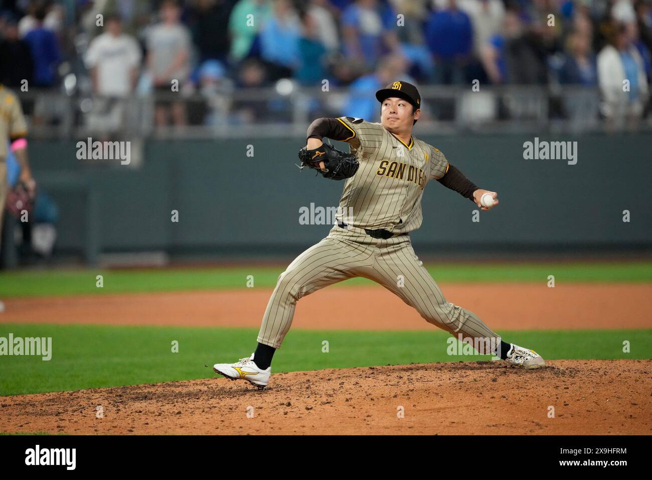 MAY 31, 2024: San Diego Padres pitcher Yuki Matsui (1) brings a pitch ...