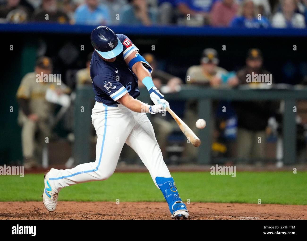 MAY 31, 2024: Kansas City Royals second base Adam Frazier (26) drives a pitch at Kauffman ...