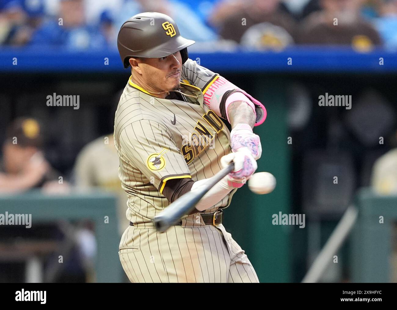 MAY 31, 2024: San Diego Padres third base Manny Machado (13) drives a ...