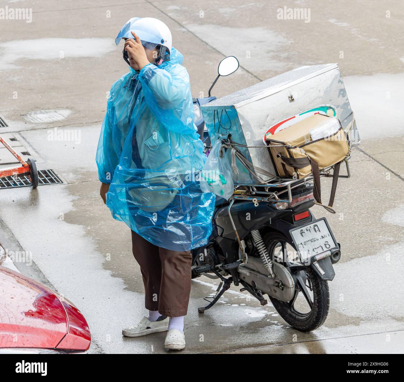 Shipment delivery on scooter hi-res stock photography and images - Alamy