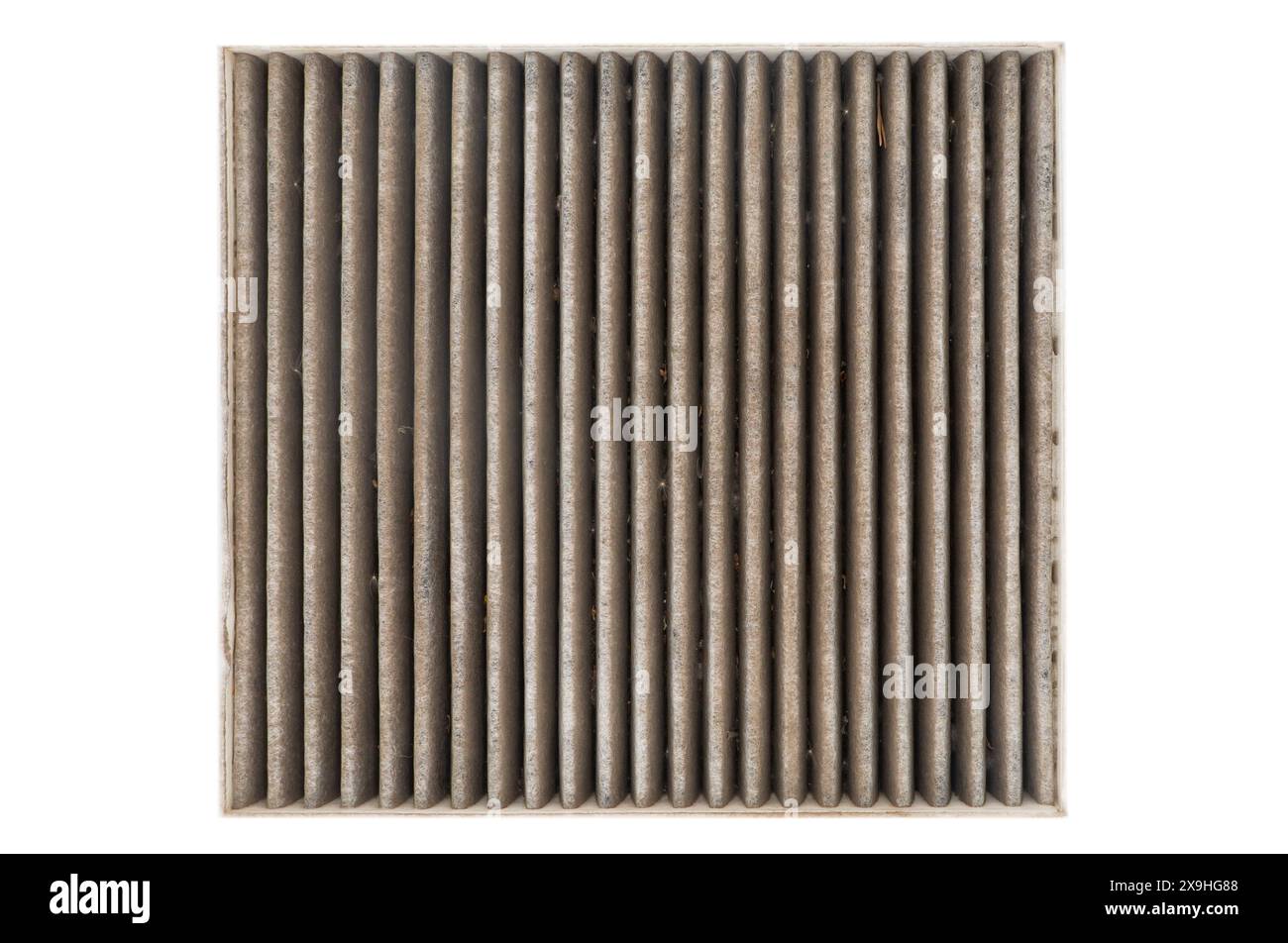 Used car cabin air filter isolated on white background. Dirty carbon ...