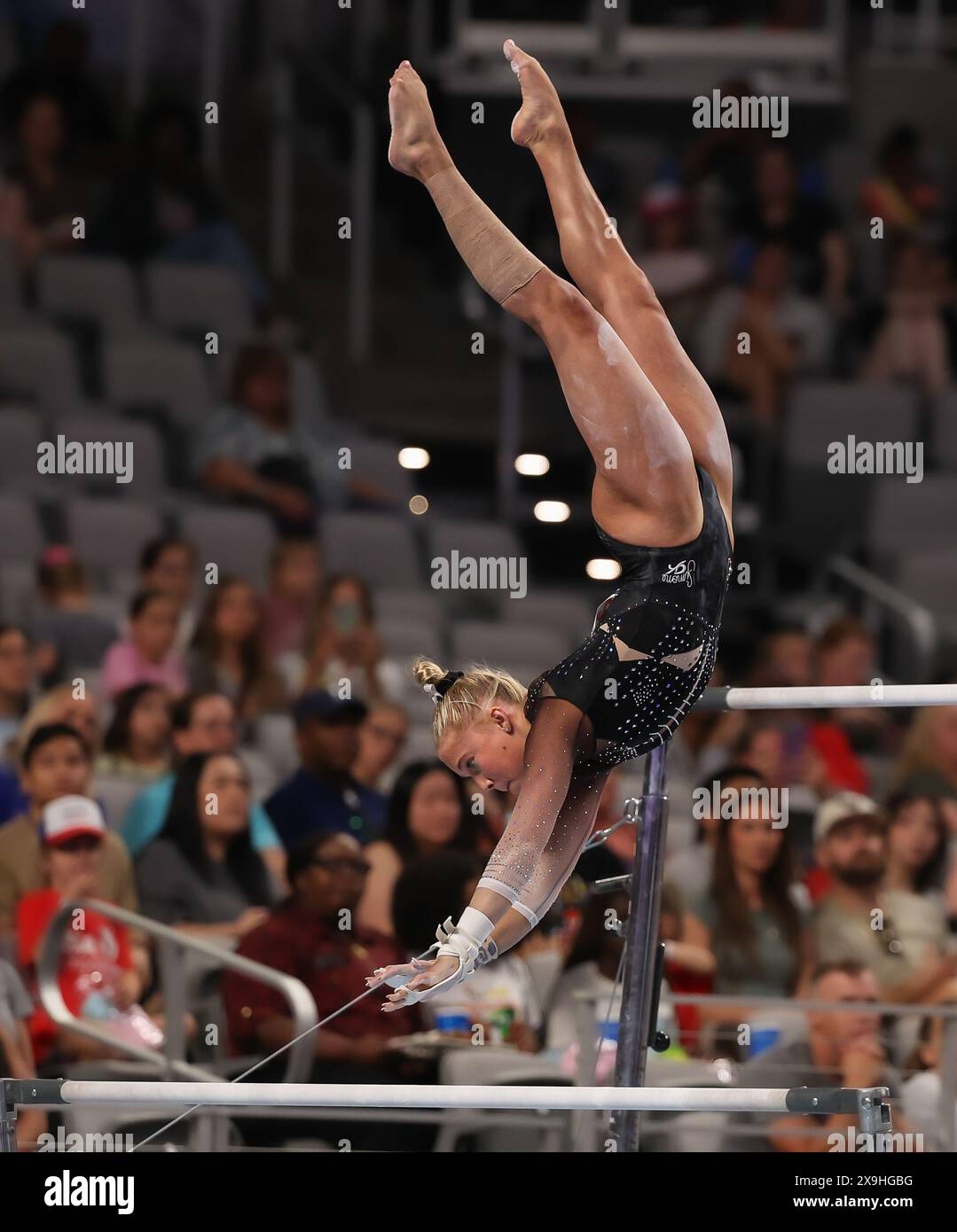 May 31, 2024: Reese Esponda competes on the uneven parallel bars during ...
