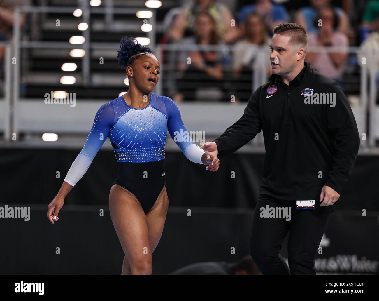 May 31, 2024: Trinity Thomas is met by her coach owen Field after a ...