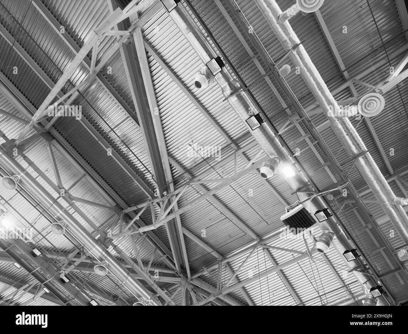 Lights and ventilation system in long line on ceiling of the industrial ...