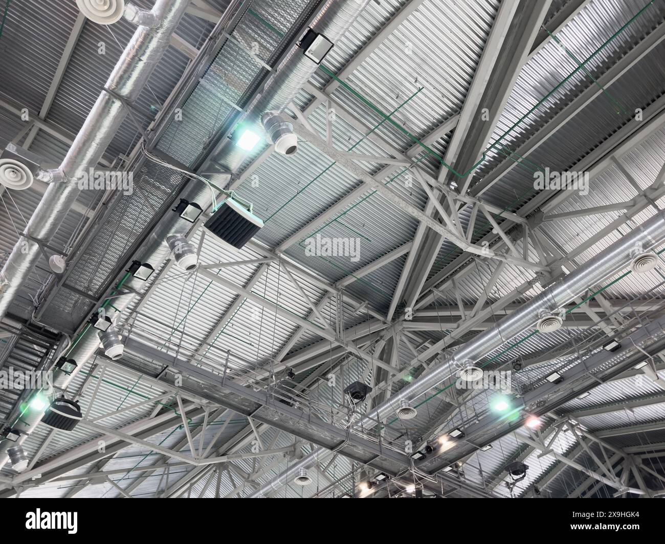 Lights and ventilation system in long line on ceiling of the industrial ...