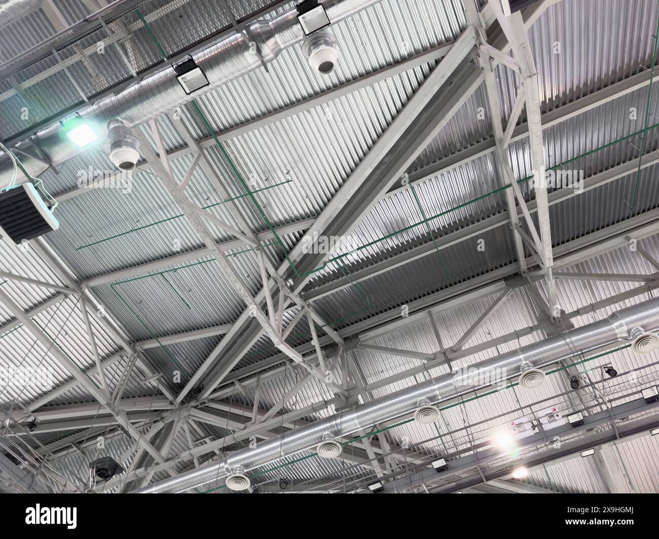 Lights and ventilation system in long line on ceiling of the industrial ...