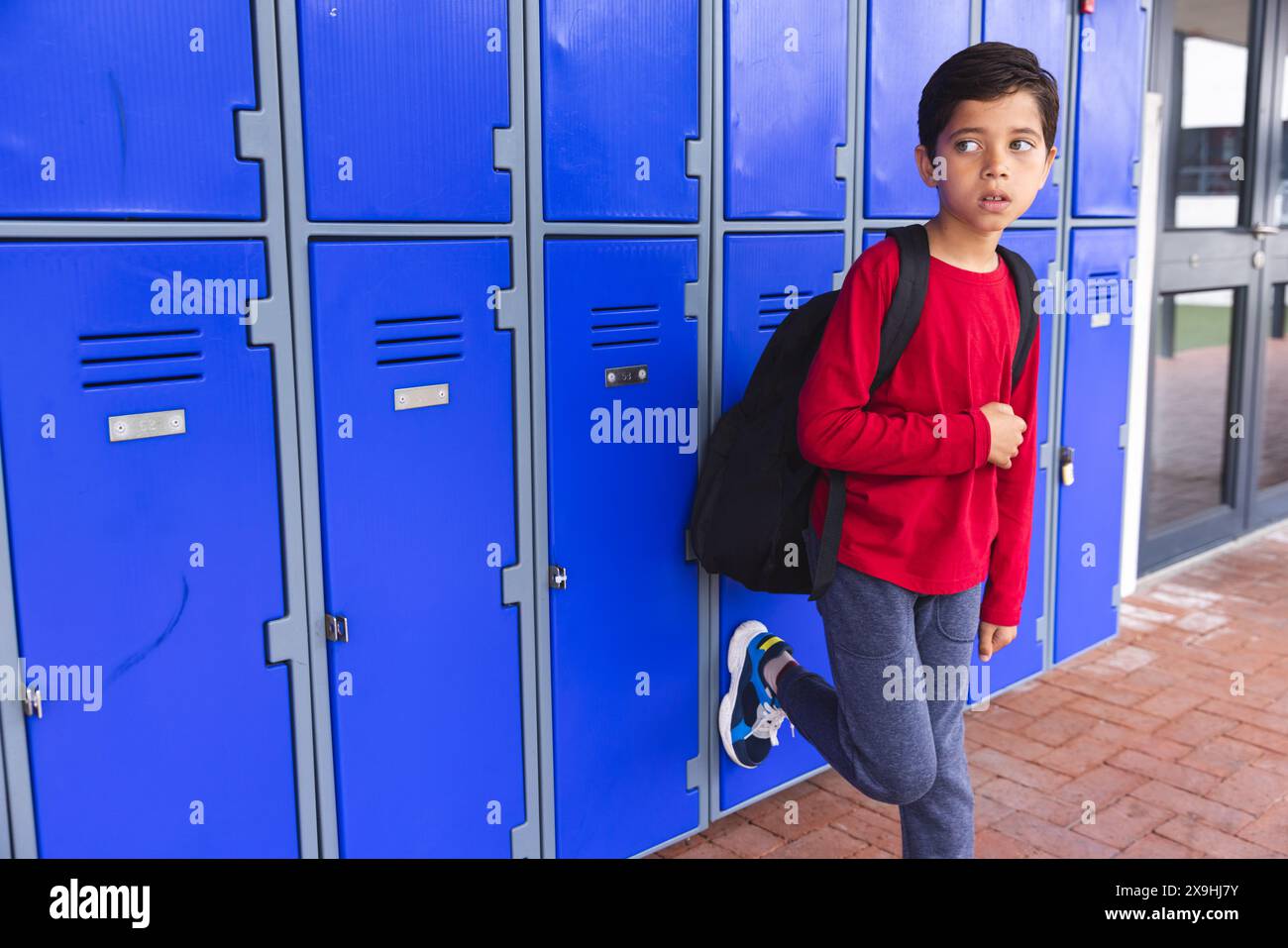 Teenage male student leaning hi-res stock photography and images - Alamy
