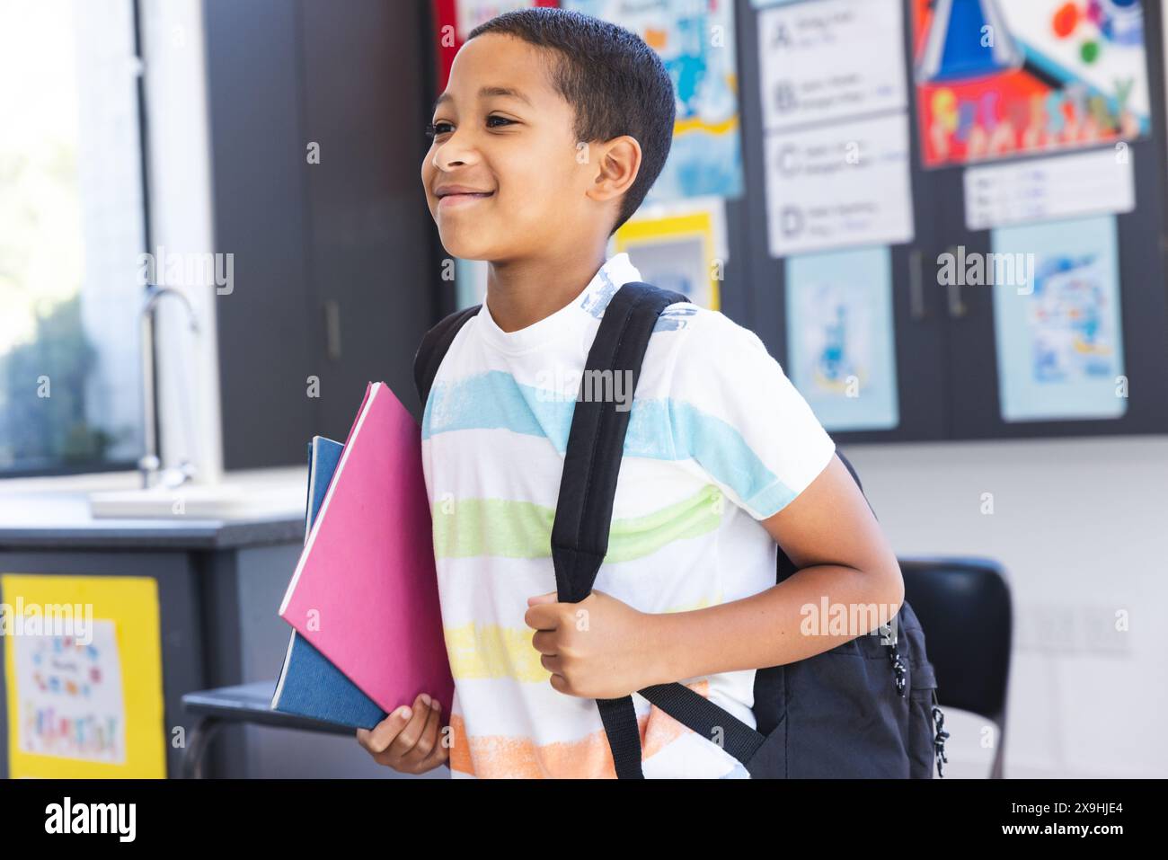 Biracial boy ready for school Stock Photo - Alamy