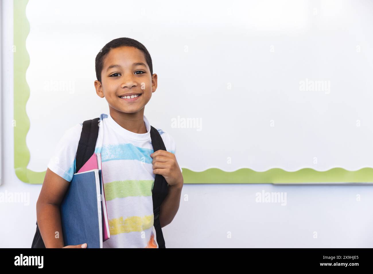 Biracial boy ready for school, with copy space Stock Photo - Alamy
